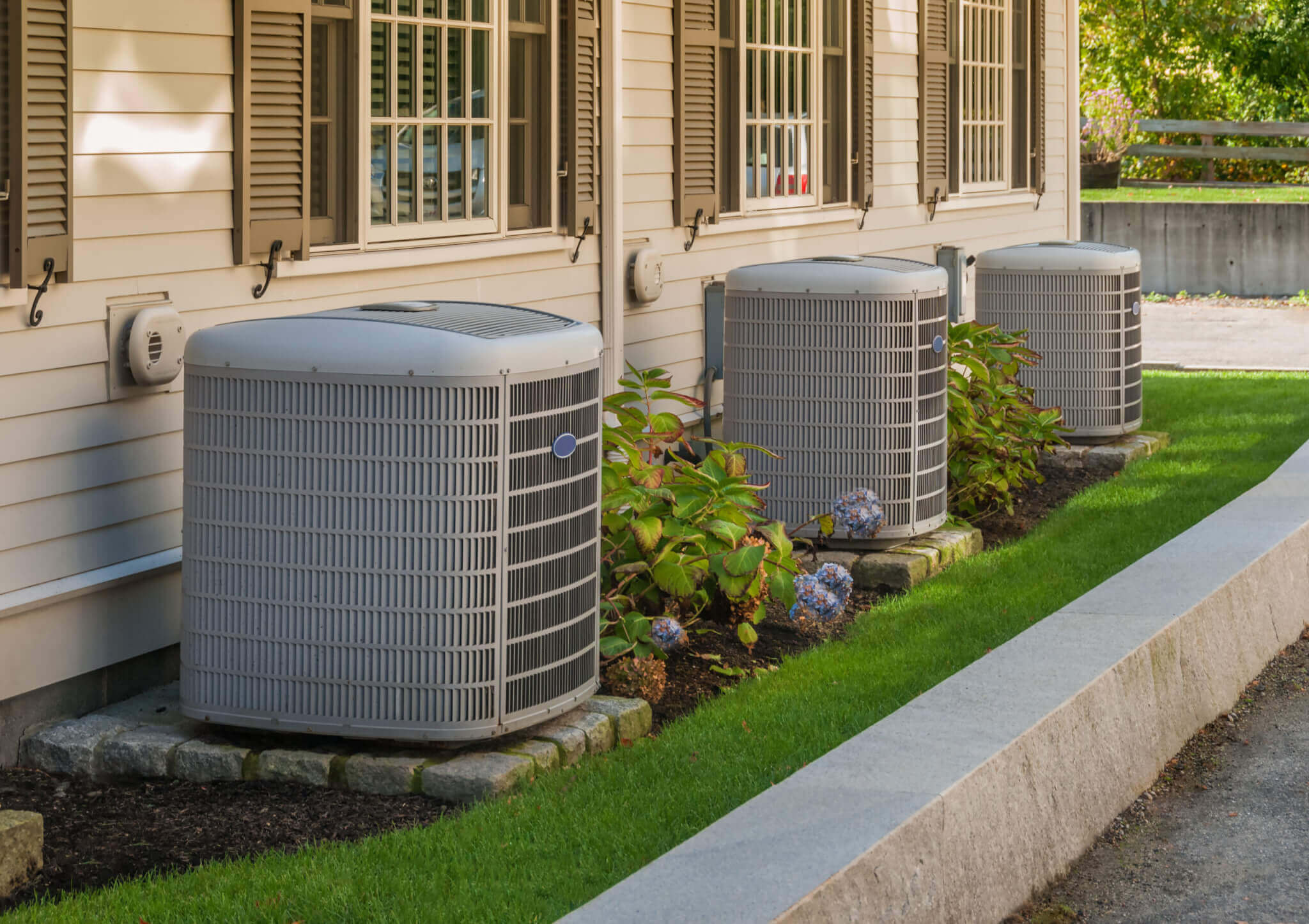 How To Hide an Air Conditioner Unit Outside - Today's Homeowner